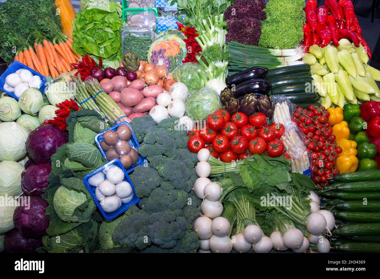 Assorted fresh ripe fruit red yellow purple and green vegetables mixed ...