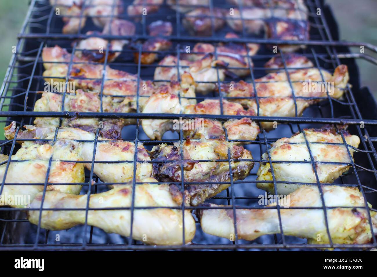 Chicken legs on grill Stock Photo - Alamy