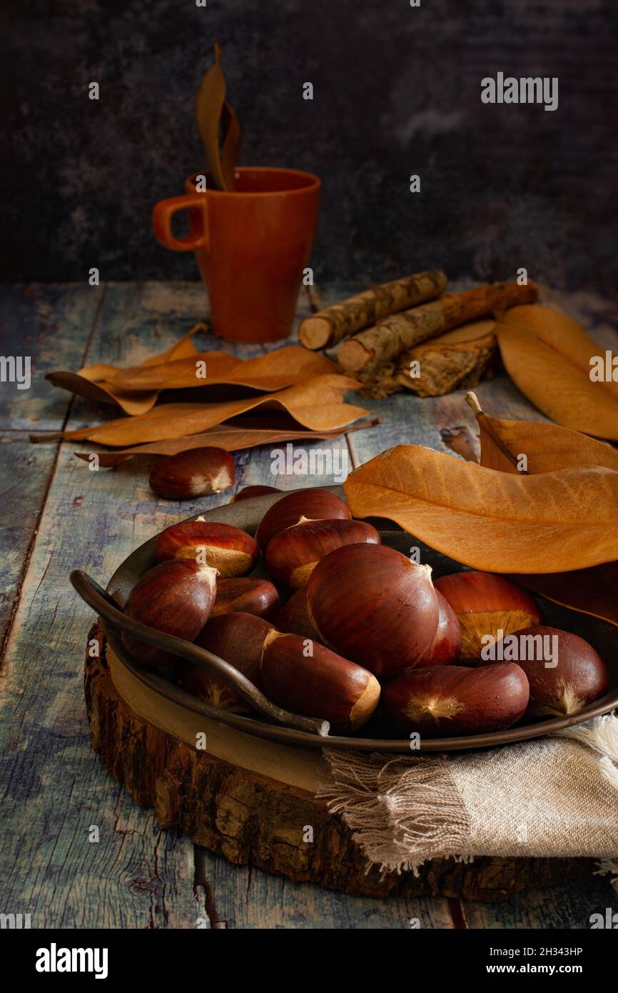 autumn background with Italian chestnuts Stock Photo - Alamy