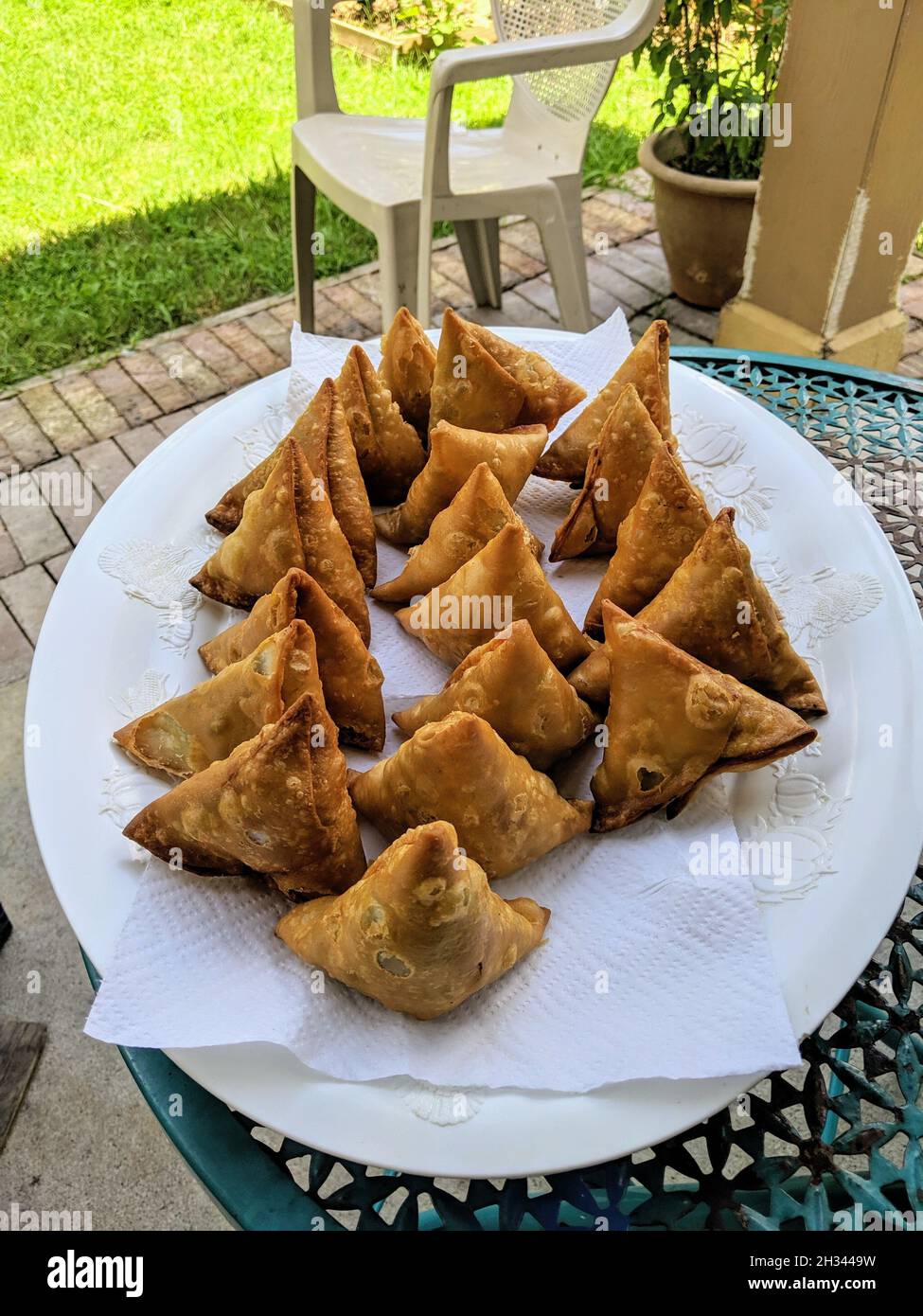 Italian Samosa food served on a plate Stock Photo - Alamy