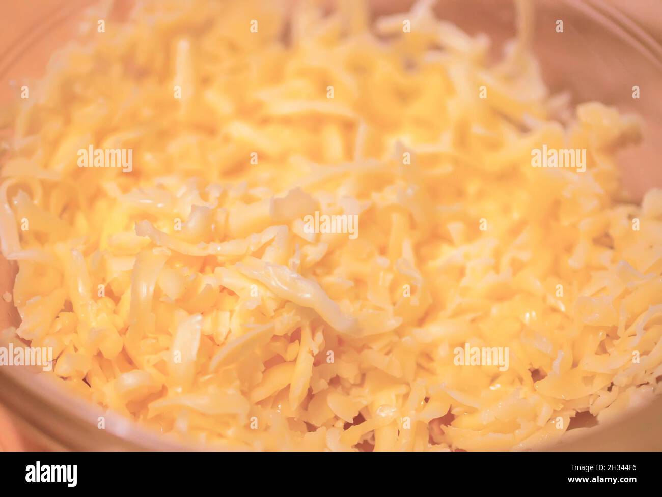 Shredded cheese close up. Ingredient for cooking Stock Photo - Alamy