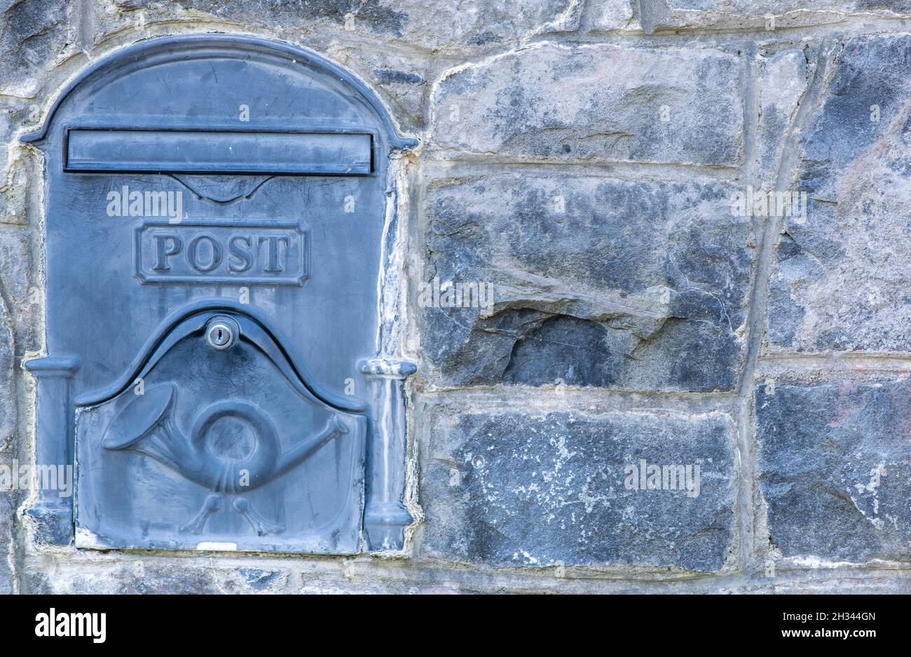 Mailboxes mounted at entry gates, mailboxes embedded in a stone wall ...