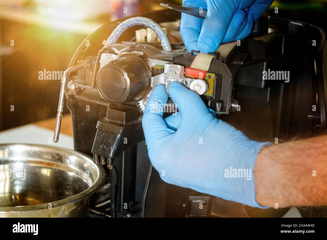 Repairs the coffee machine hi-res stock photography and images - Alamy