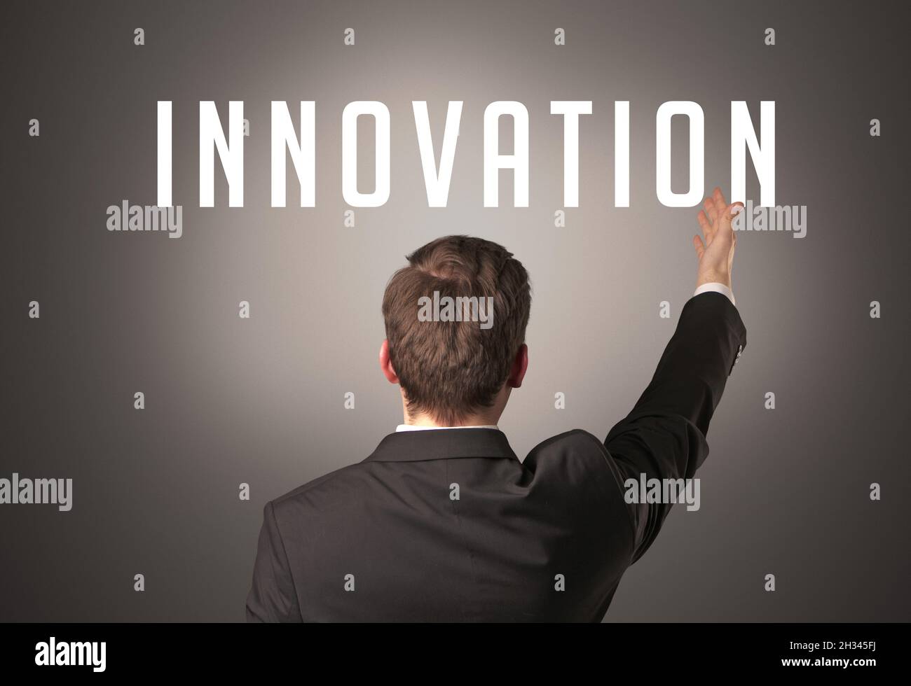 Rear view of a businessman, powerfull business concept Stock Photo - Alamy