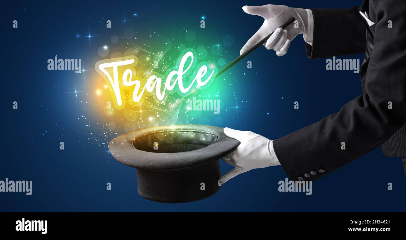 Young magician is showing magic trick Stock Photo - Alamy