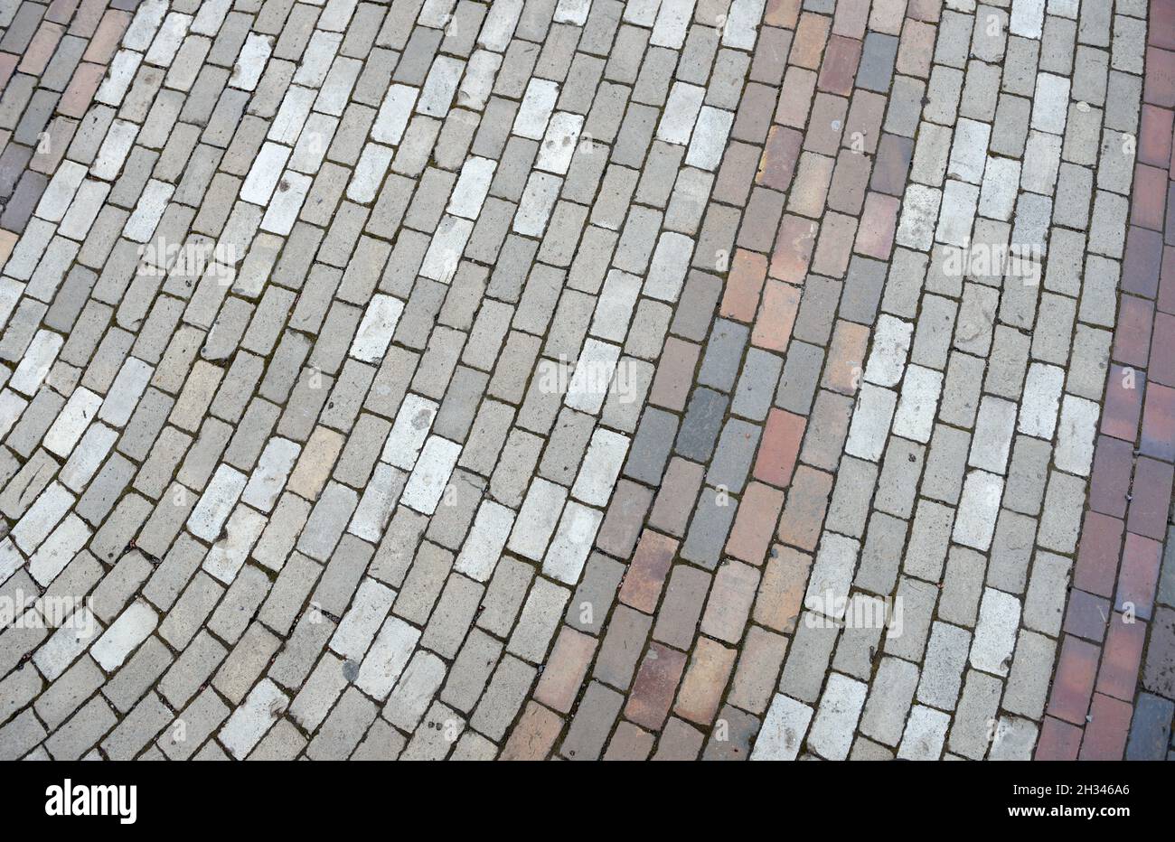 Tinted pavement bricks of grey and reddish colors as background Stock ...