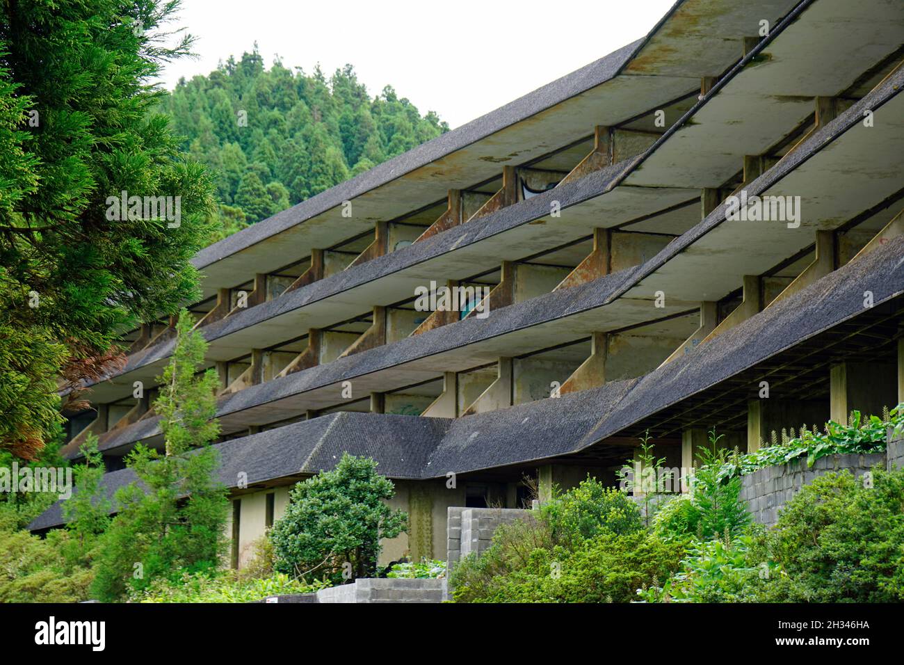 rotten structure of a hotel on the azores islands Stock Photo - Alamy
