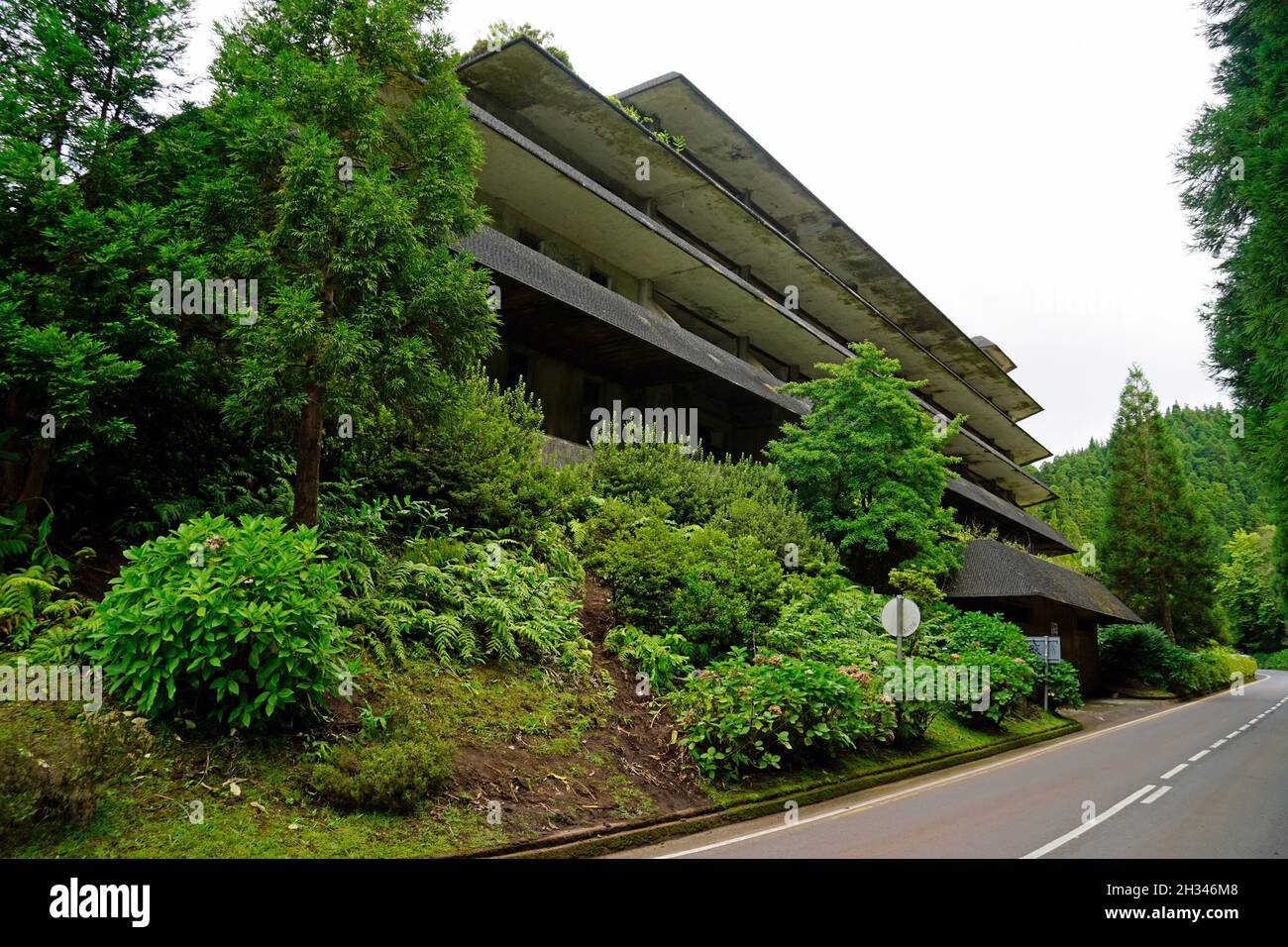 rotten structure of a hotel on the azores islands Stock Photo - Alamy