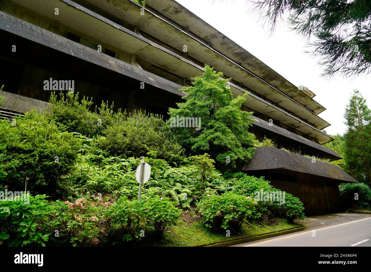 rotten structure of a hotel on the azores islands Stock Photo - Alamy