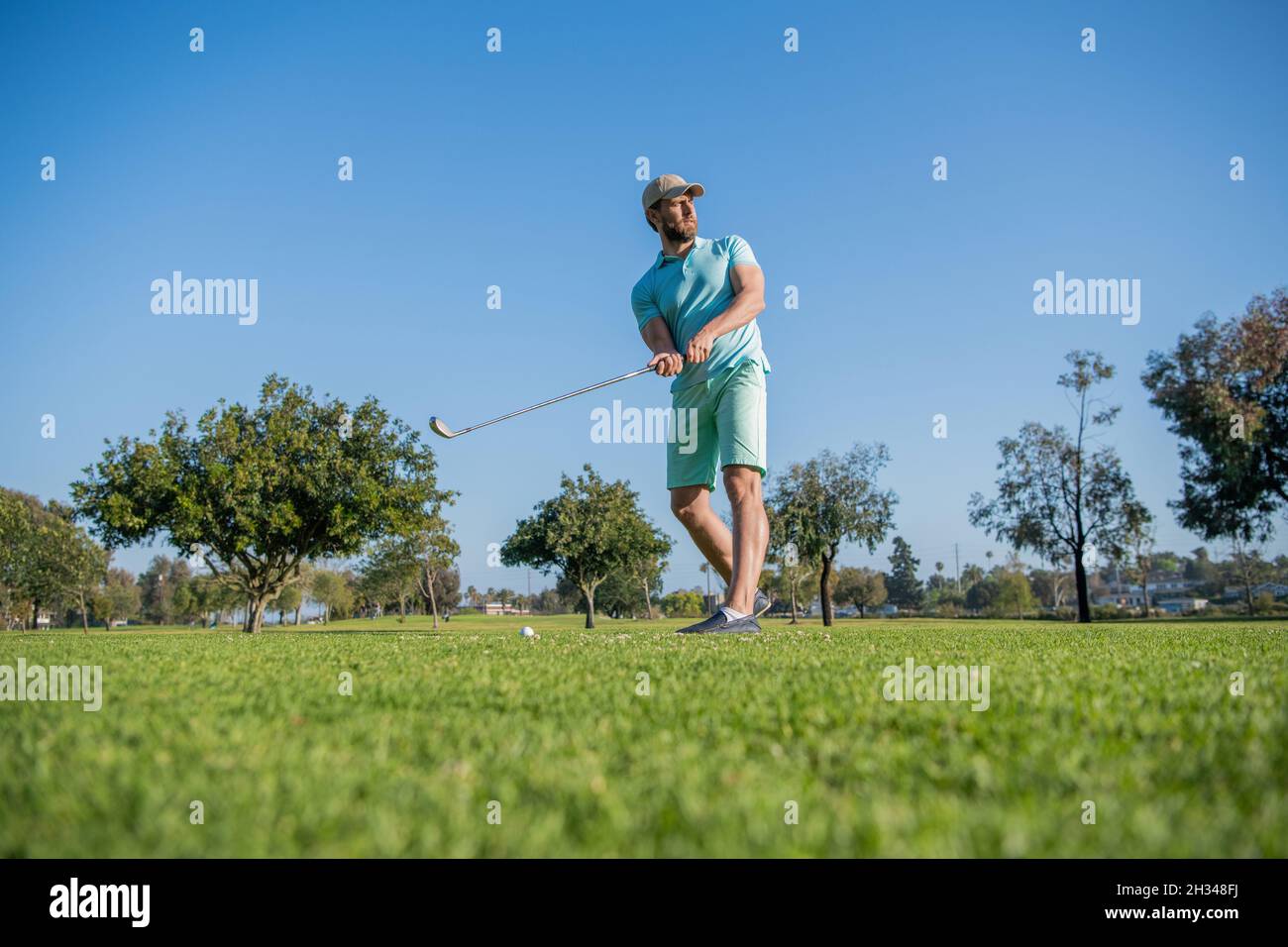 healthy man playing game on green grass. summer activity. professional ...