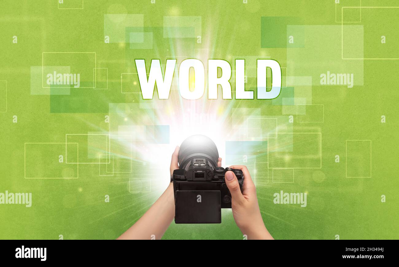 hand holding digital camera, traveling concept Stock Photo - Alamy