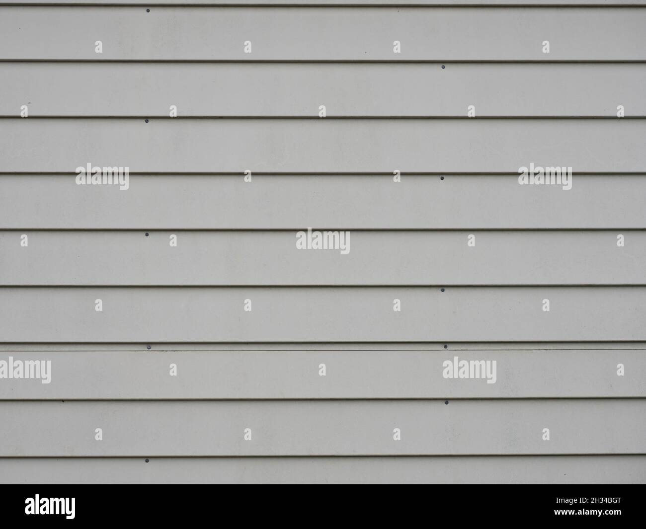 Weatherboard house wall for texture or background Stock Photo - Alamy