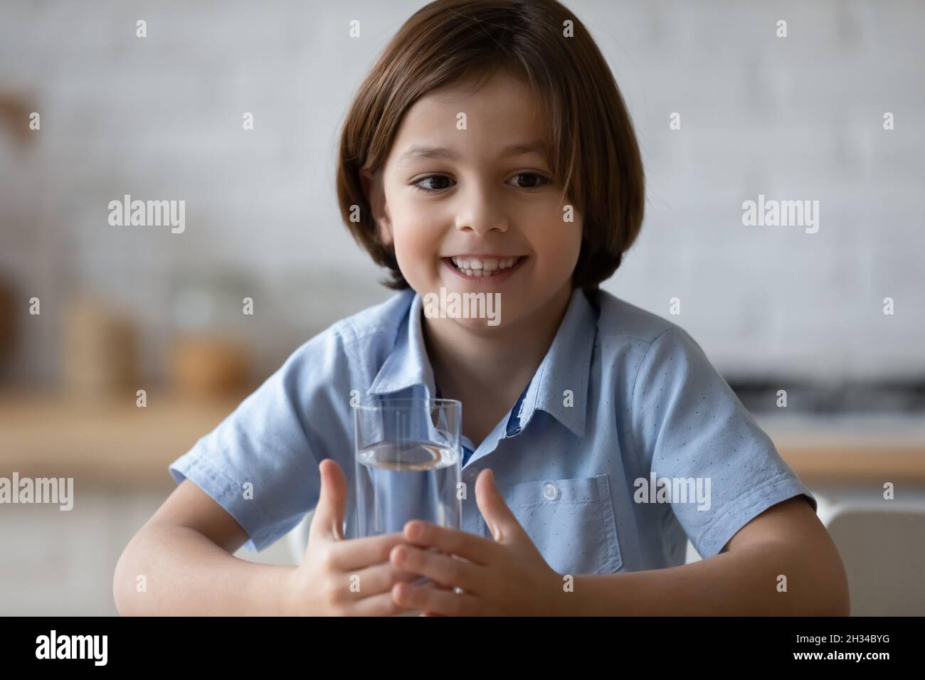 Happy thirsty boy drinking pure fresh clean water Stock Photo - Alamy