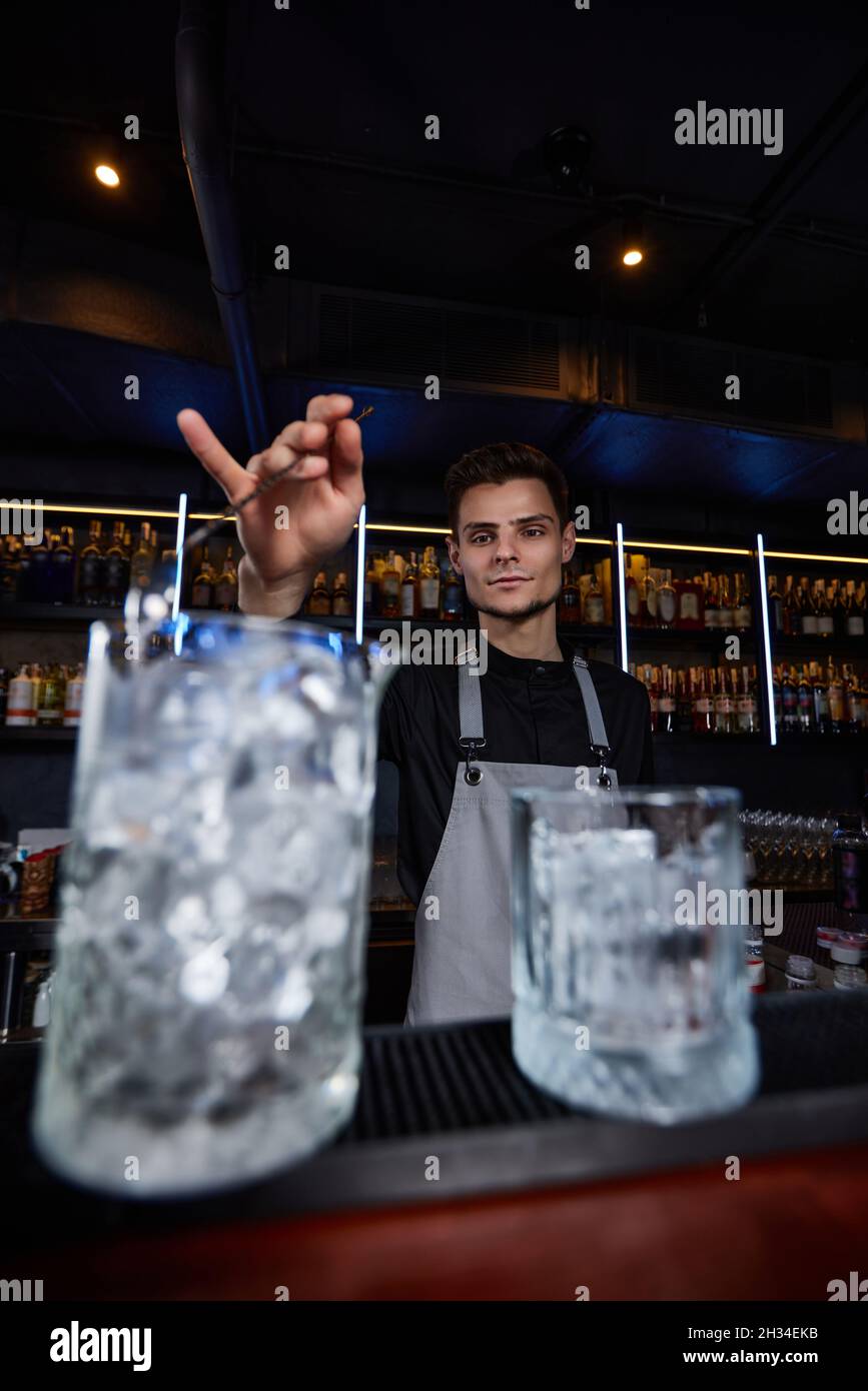 Stirring cocktail in glass spoon hi-res stock photography and images ...