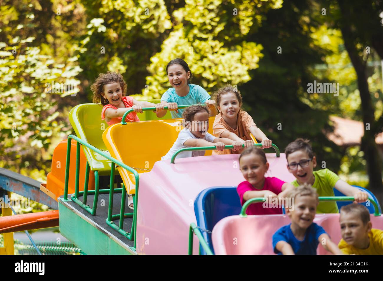 The children experience great emotions of roller coaster riding Stock ...