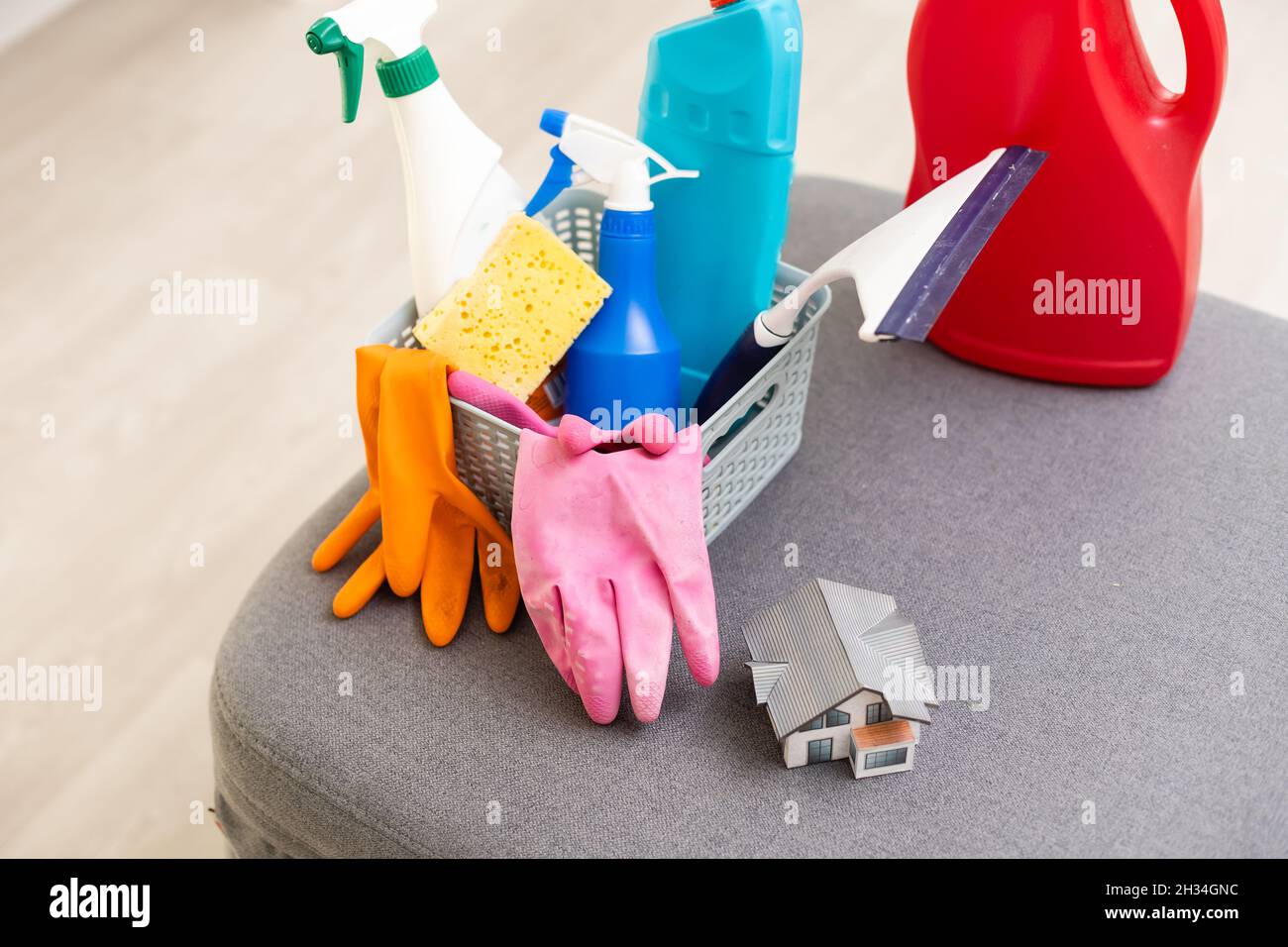 Assorted cleaning products on white background Stock Photo - Alamy