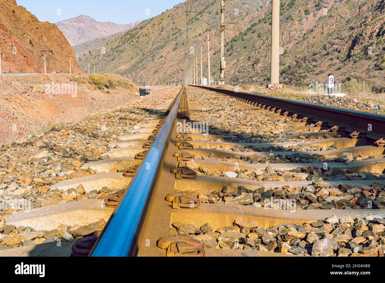 Rail closeup. Low angle perspective view of train rails Stock Photo - Alamy