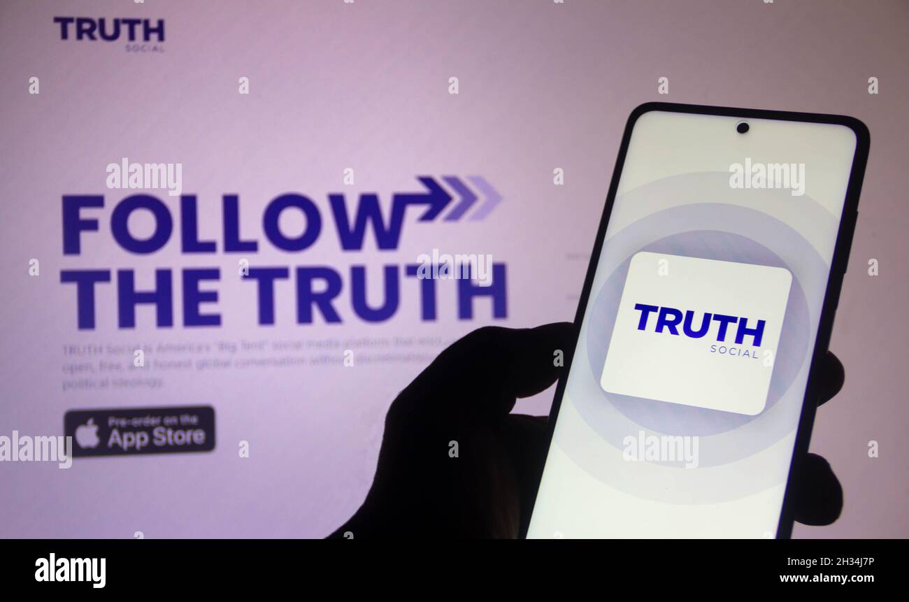 In this photo illustration the Truth Social logo seen displayed on a ...