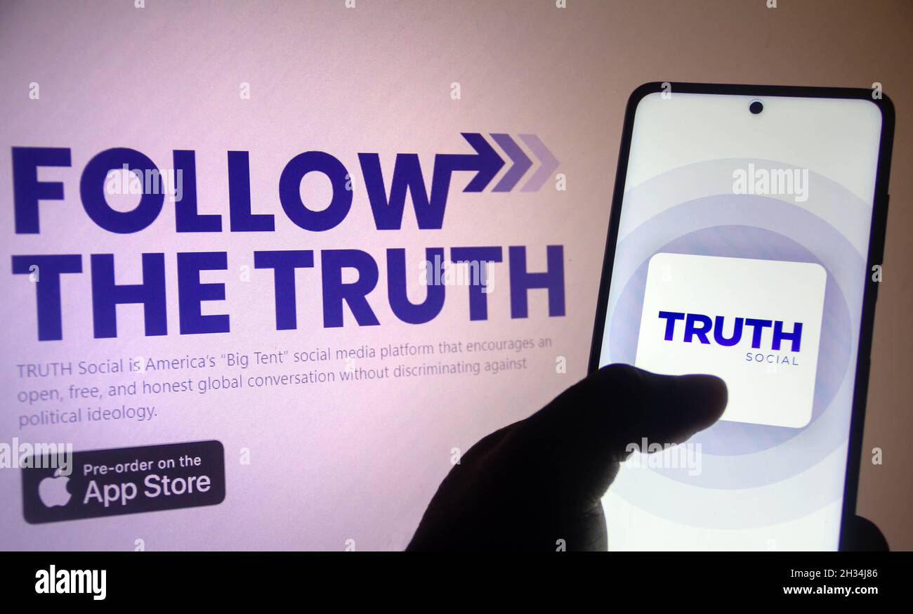 In this photo illustration the Truth Social logo seen displayed on a ...