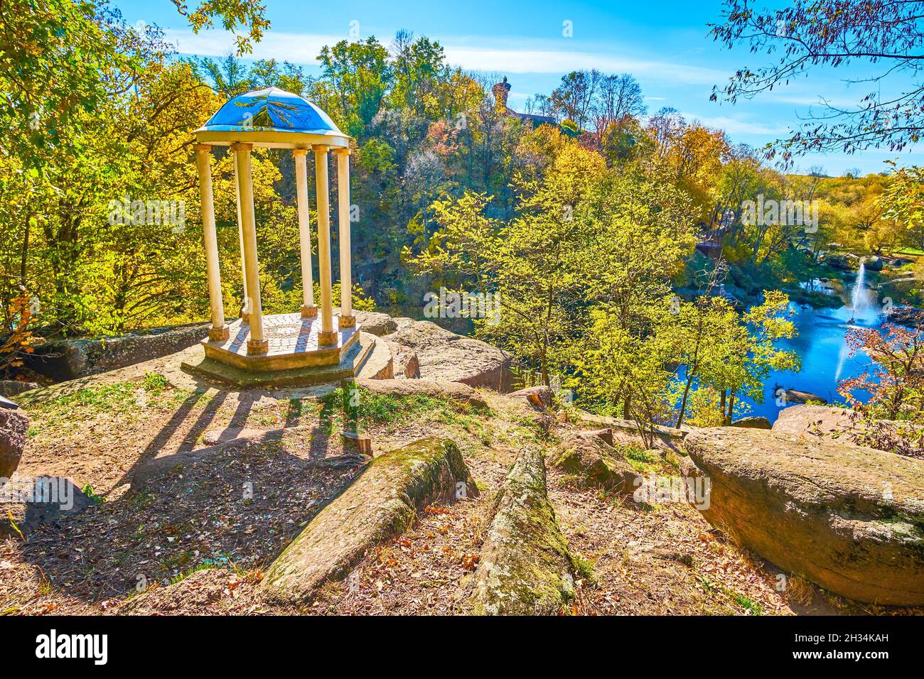 The small alcove on the rocky bank of Uzh river in Drevlians Park of ...