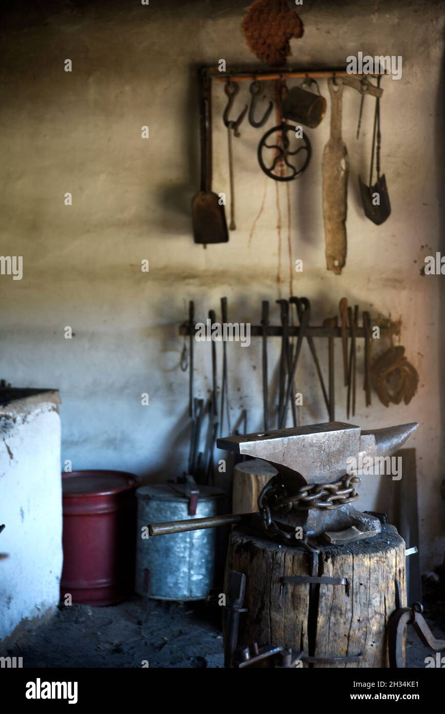 Antique tools and anvil in the blacksmith shop at El Rancho de las ...