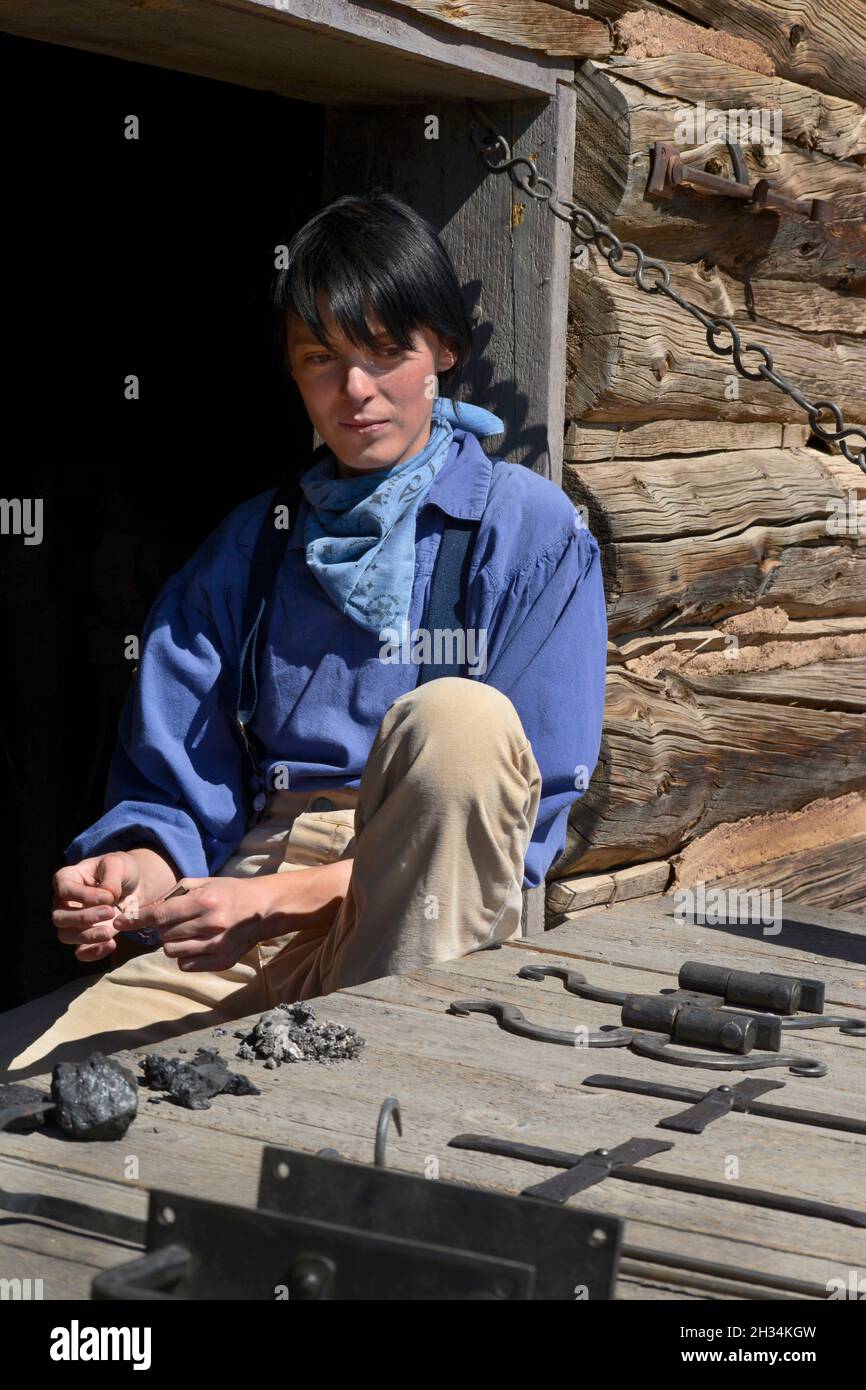 A blacksmith apprentice shows off her work at the blacksmith shop at El ...