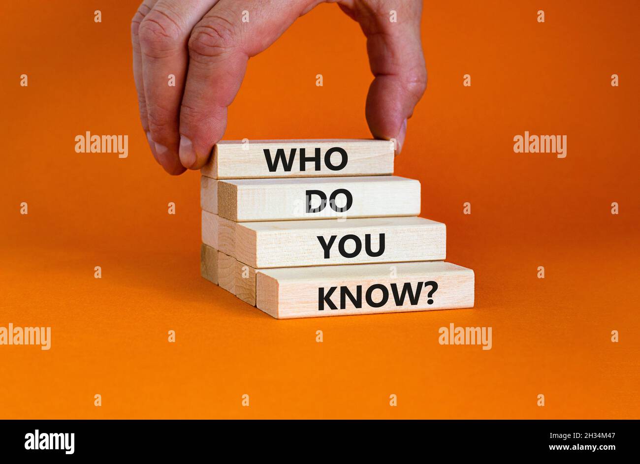 Who do you know symbol. Wooden blocks with words 'Who do you know' on ...