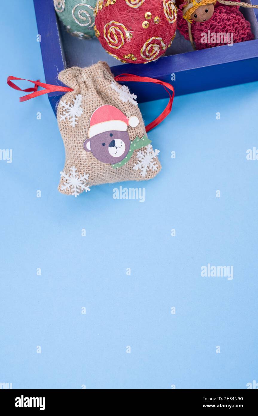 Christmas time decorations in a wooden box on blue background Stock ...