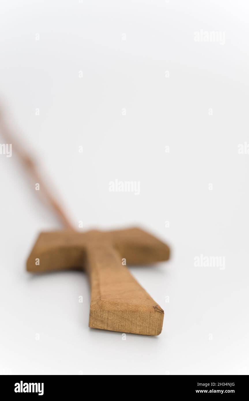 hand made wooden tau cross pendant - Greek letter tau Stock Photo - Alamy