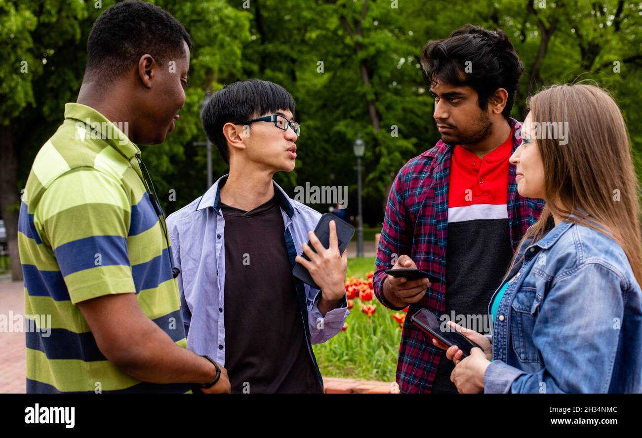 Group of diverse students easily communicate after university Stock ...