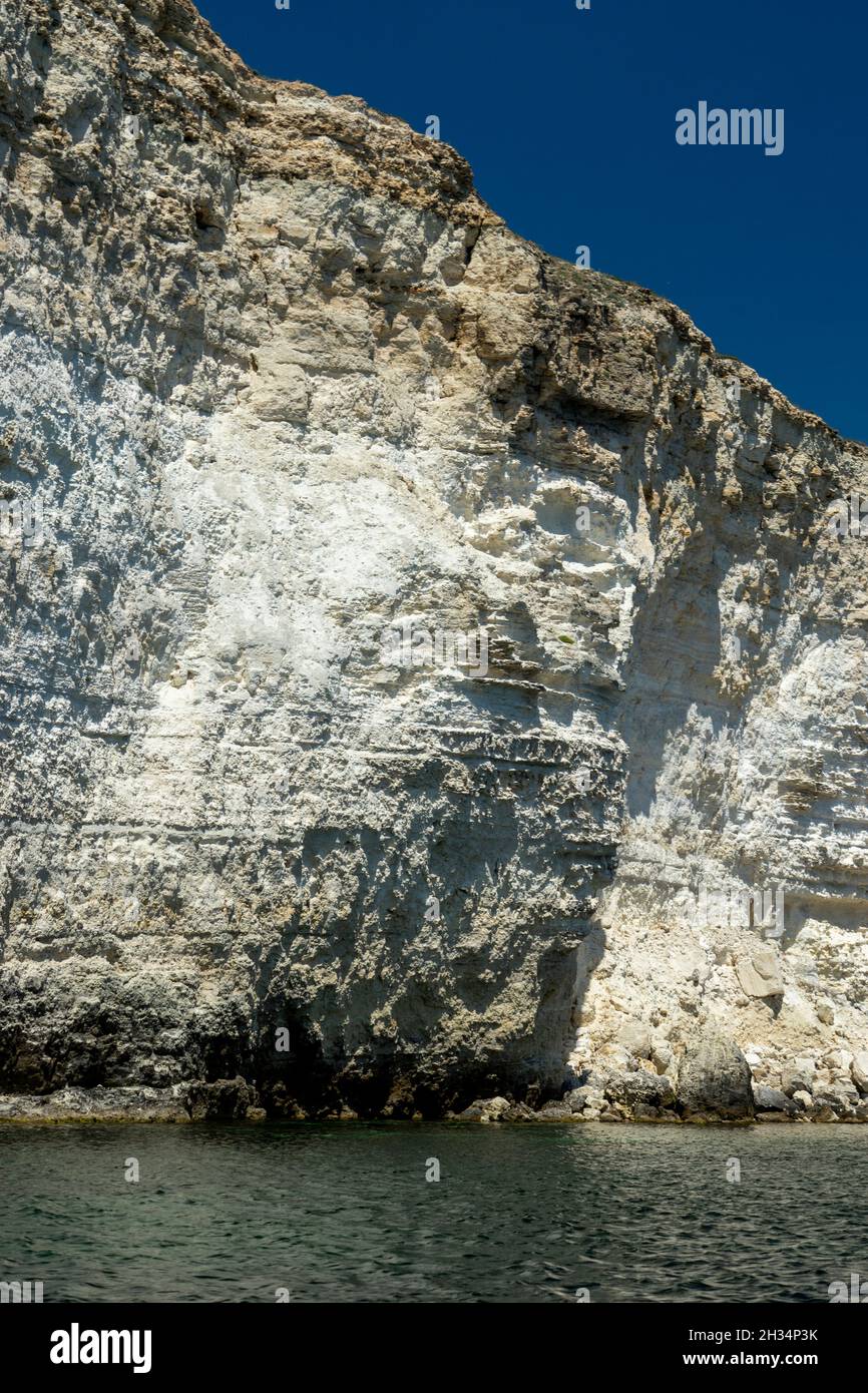 Seascape with a view of a high cliff by the sea Stock Photo - Alamy