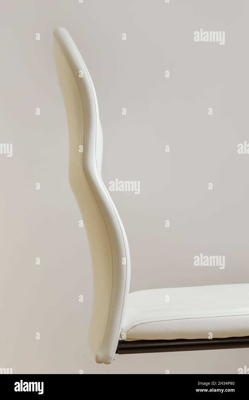 modern chair with anatomic back, side view Stock Photo - Alamy