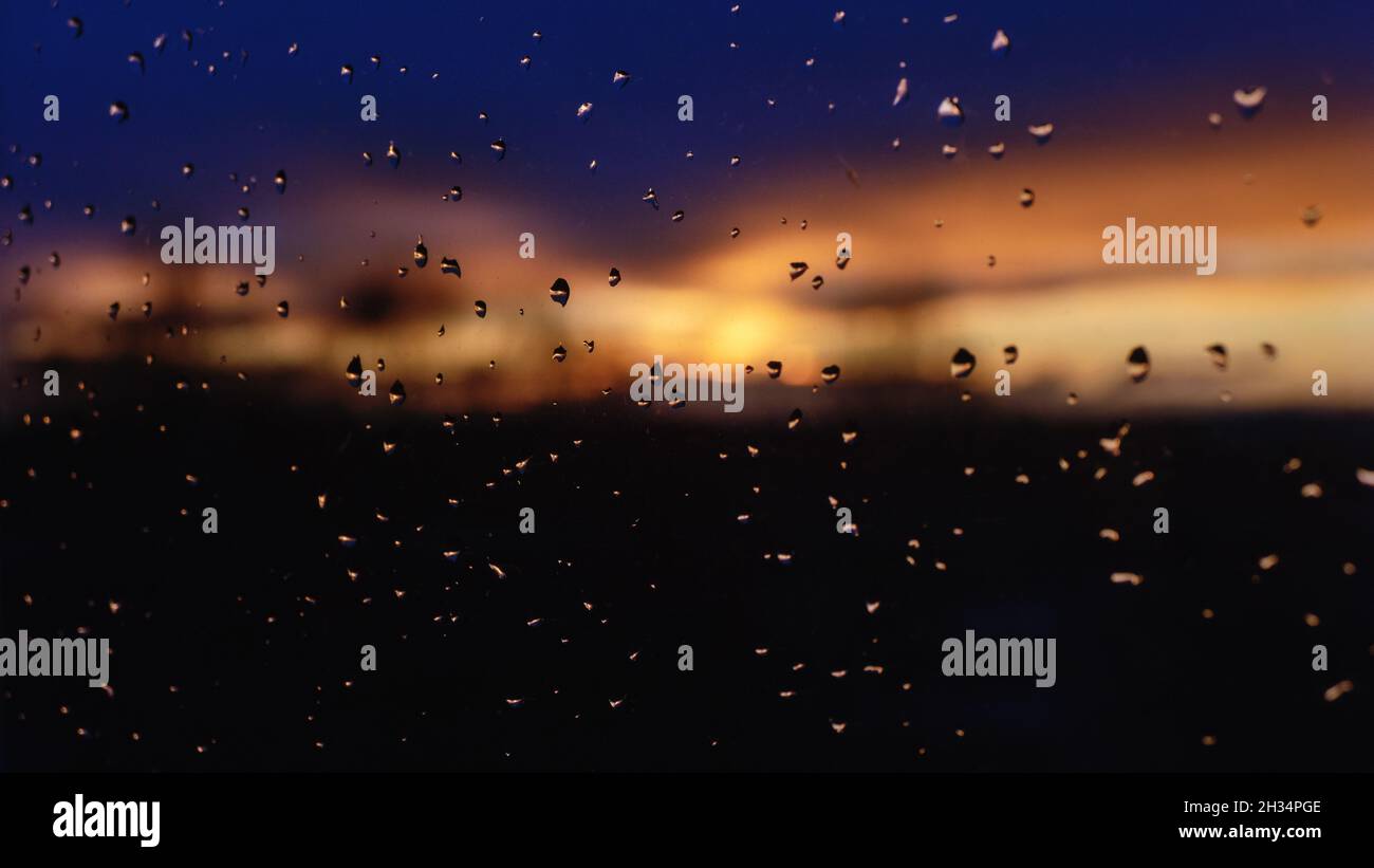 Sky behind window with rain drops hi-res stock photography and images ...