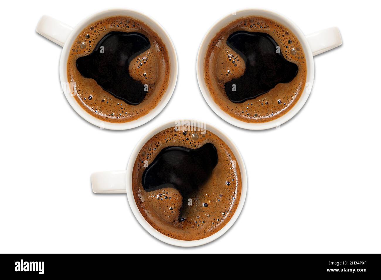 Three cups of traditional coffee on a white background Stock Photo - Alamy