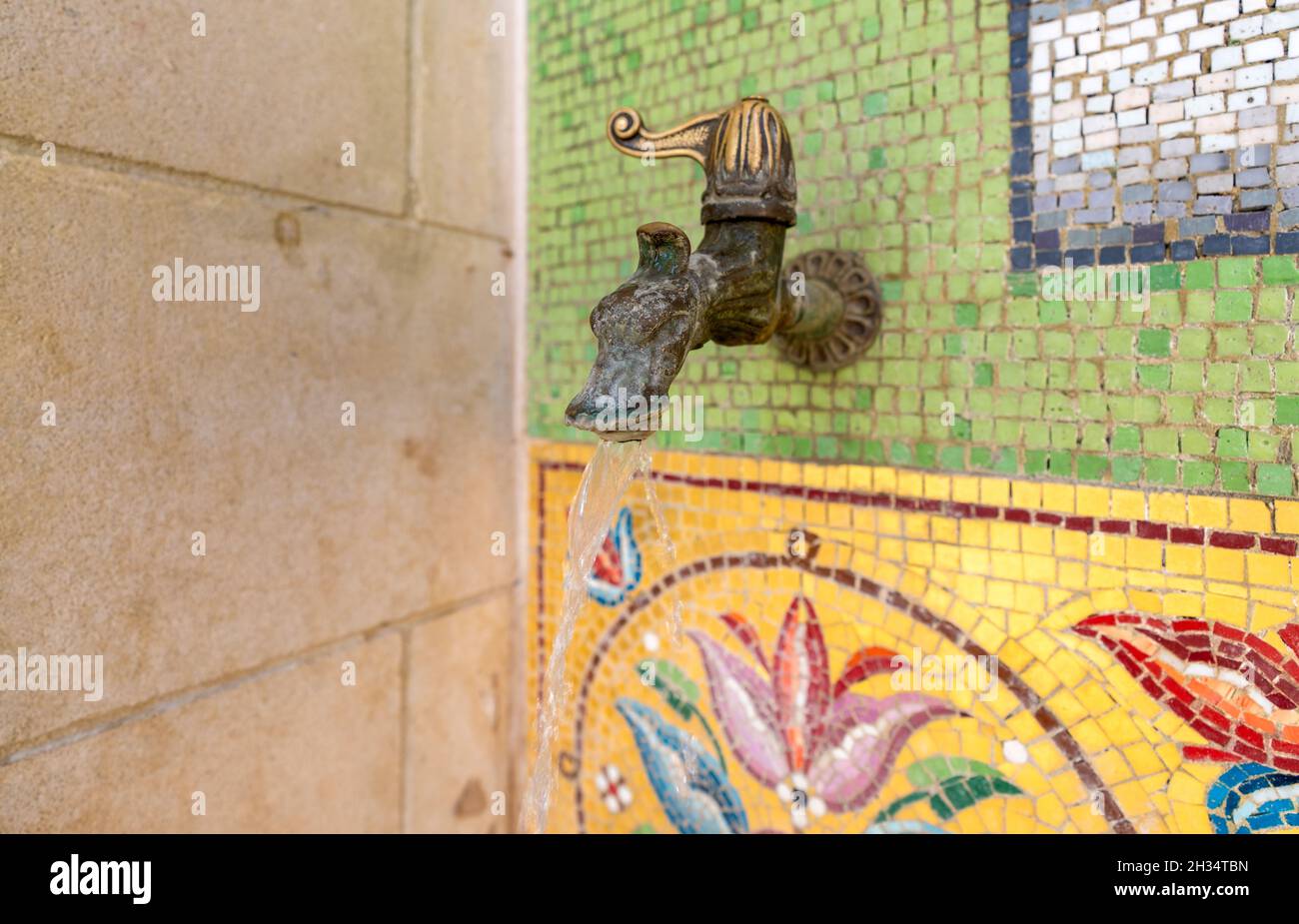 tap with holy water at the Church of the Holy Martyr Cyprian and Martyr ...