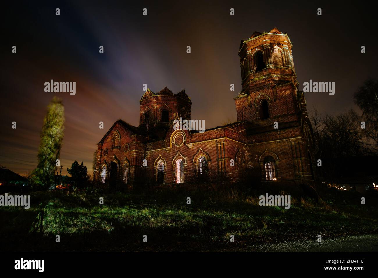 Old ancient creepy abandoned church ruins at night Stock Photo - Alamy