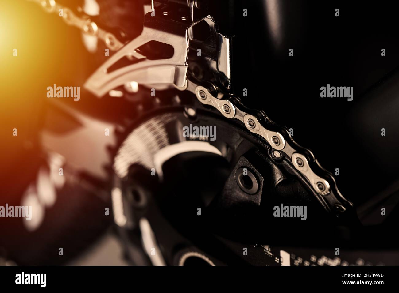 Closeup the chain and front Derailleur on the moutain bike over black ...