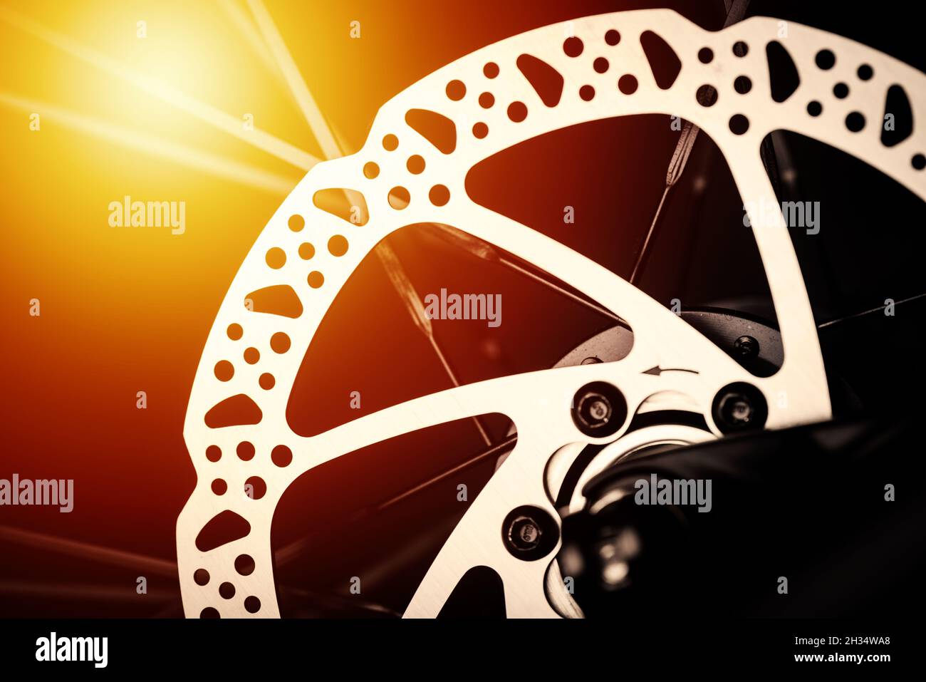 Closeup the disc break system on the moutain bike over black background ...