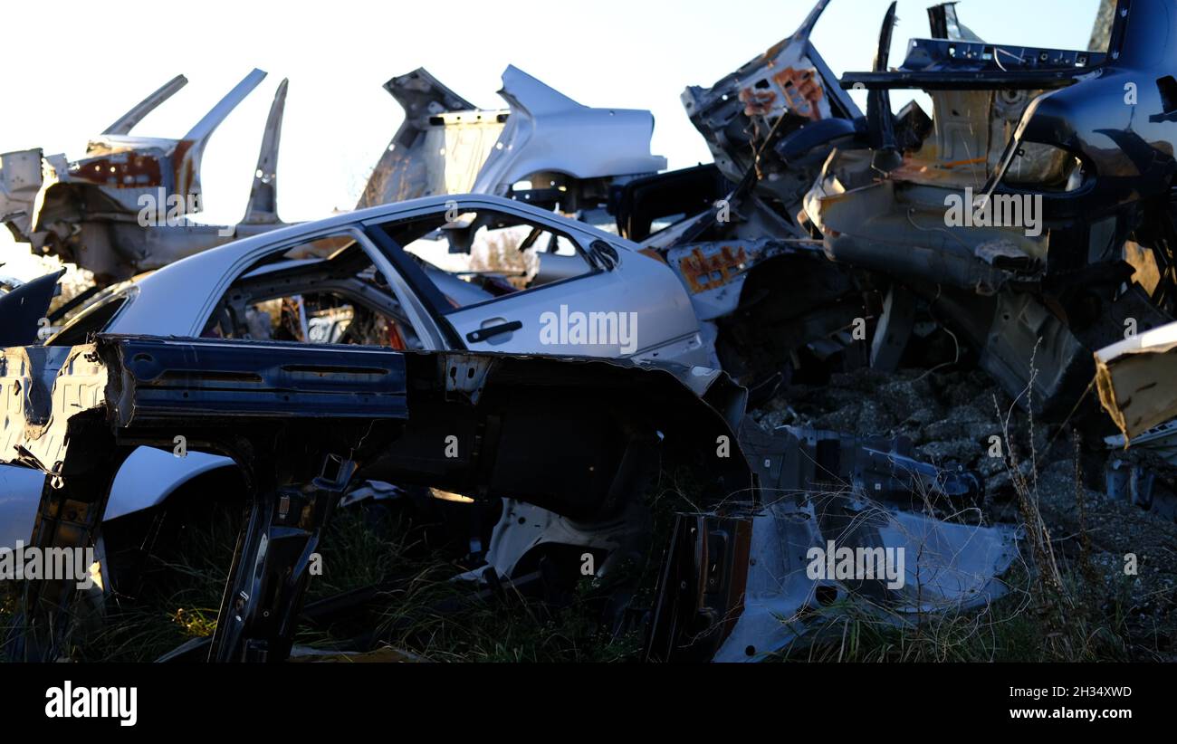 Pile of wrecked cars and auto bodies Stock Photo - Alamy