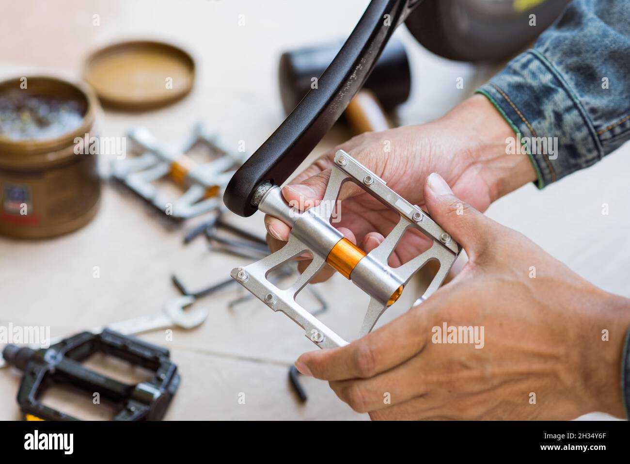 The man changing bike pedals. Mountain bike upgrade concept Stock Photo ...
