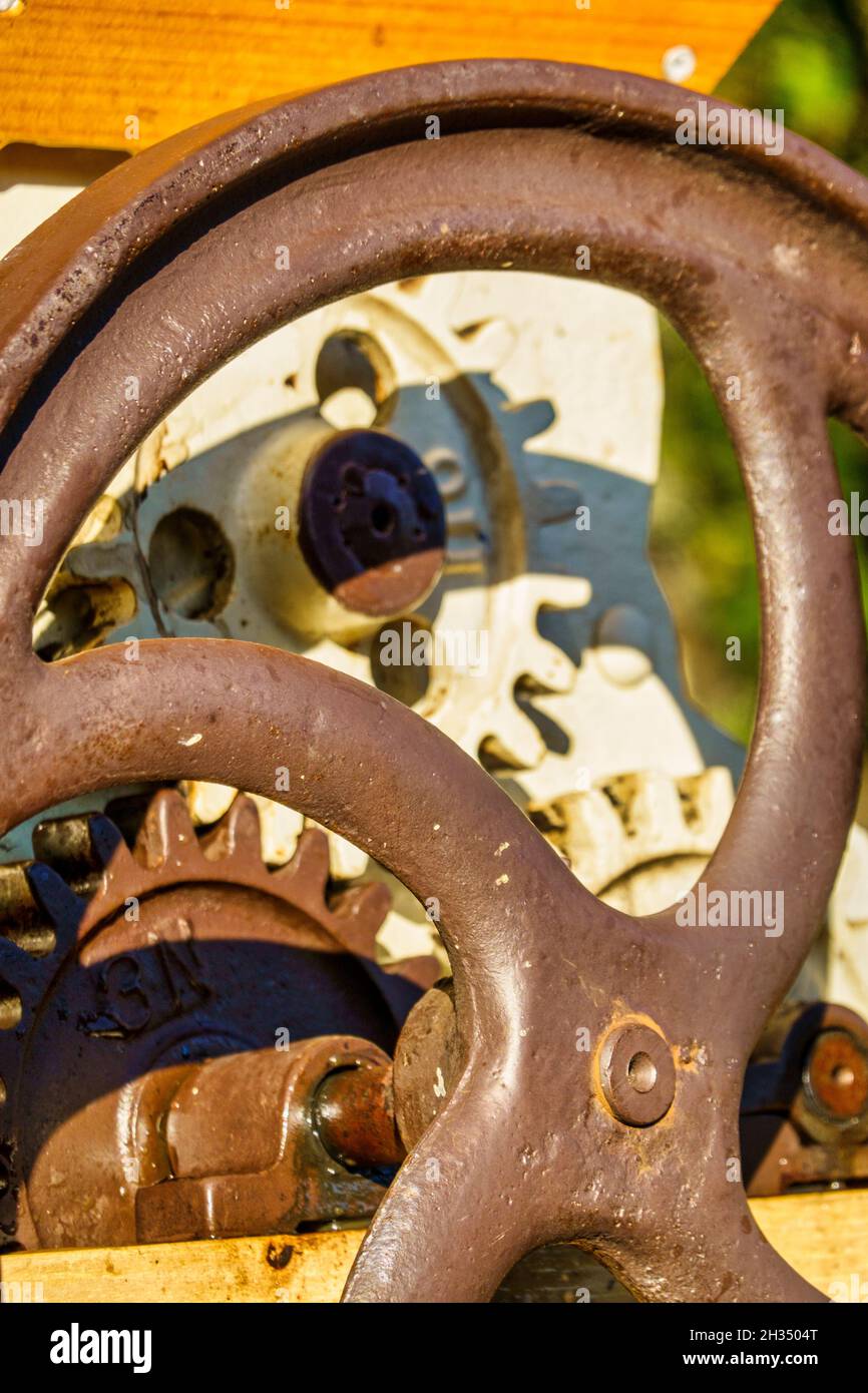 Detail of the fly wheel and gears of an antique cider press in Glendale ...