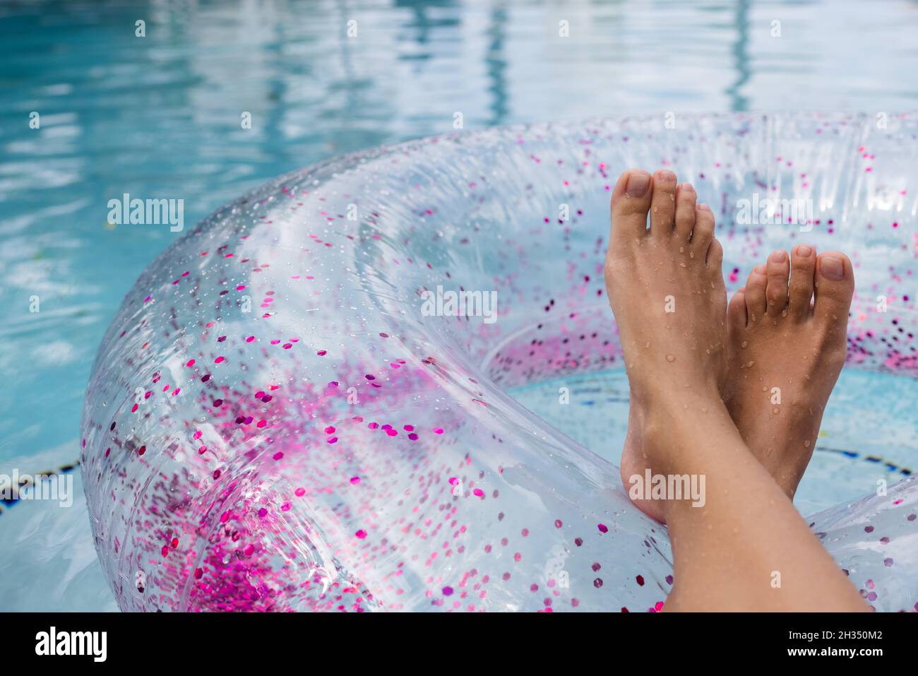 Floaties in pool hi-res stock photography and images - Alamy