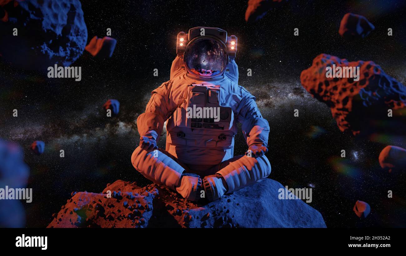 astronaut meditating on asteroid Stock Photo - Alamy