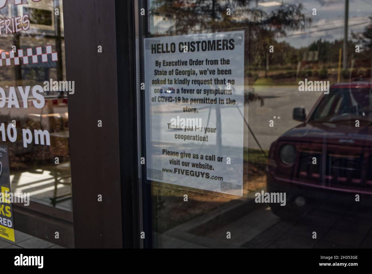 Grovetown, Ga USA - 10 14 21: Five Guys burger restaurant sign covid-19 ...