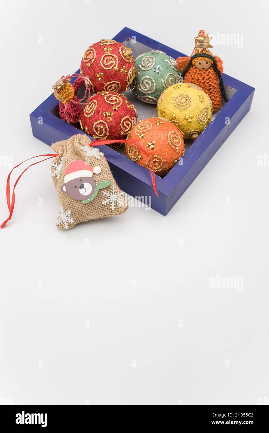 Christmas time decorations in a wooden box on white background Stock ...