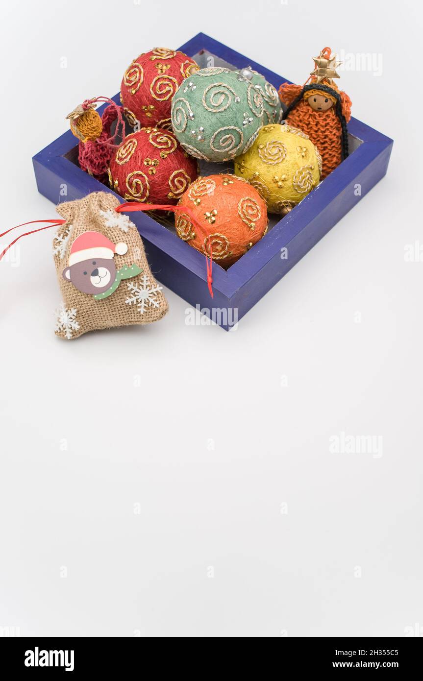 Christmas time decorations in a wooden box on white background Stock ...