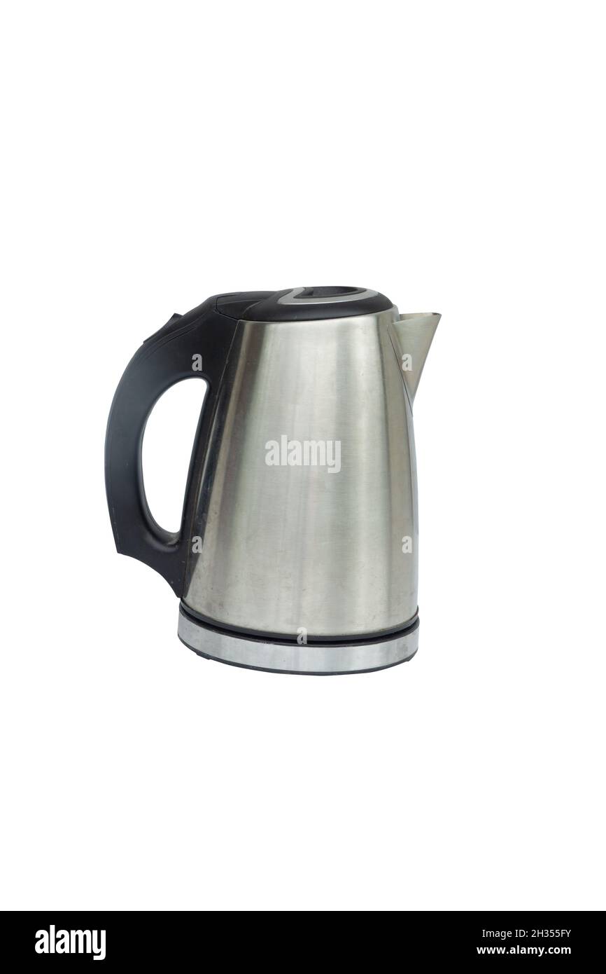 Electric stainless steel kettle on a granite countertop against on ...