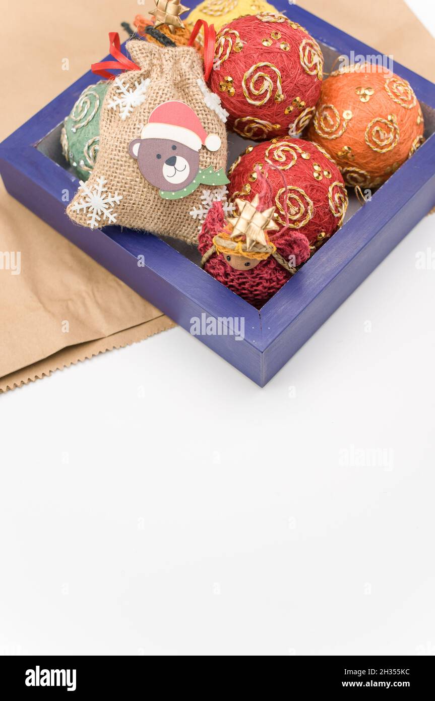 Christmas time decorations in a wooden box on white background Stock ...