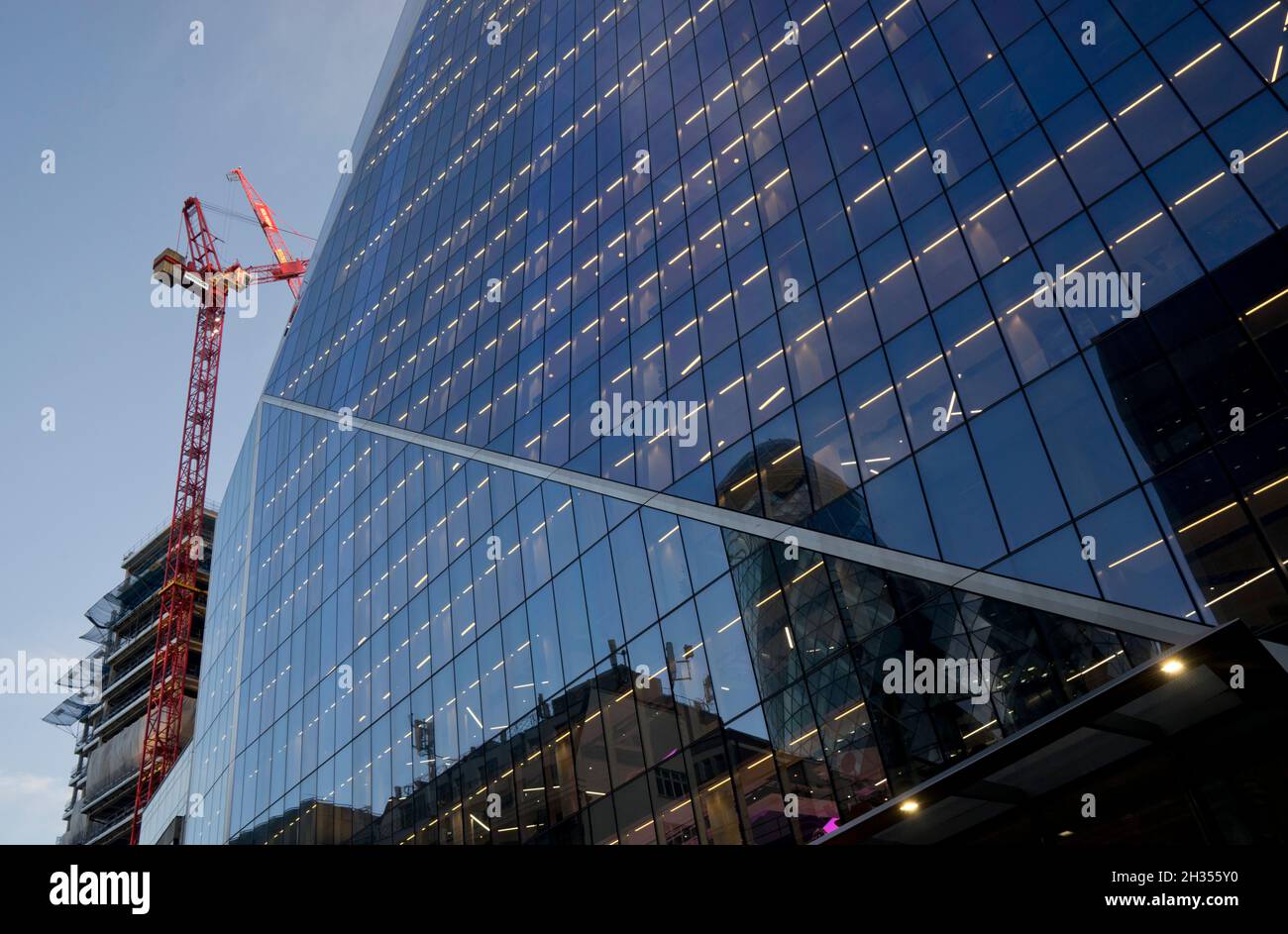 New office skyscrapers construction and reflections from windows in the ...