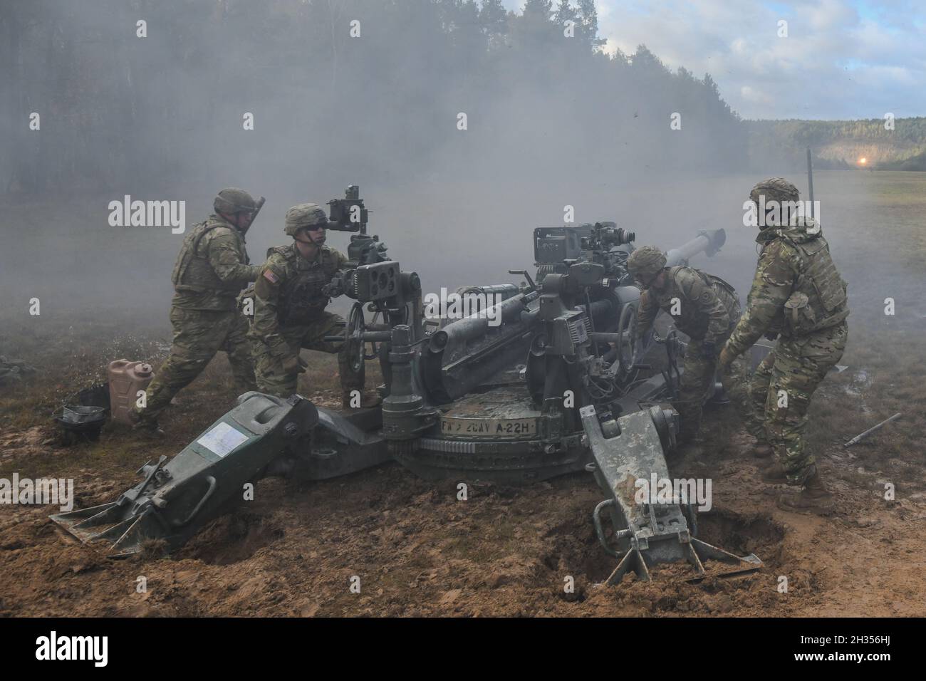 U.S. Soldiers with Field Artillery Squadron, 2nd Cavalry Regiment fire ...